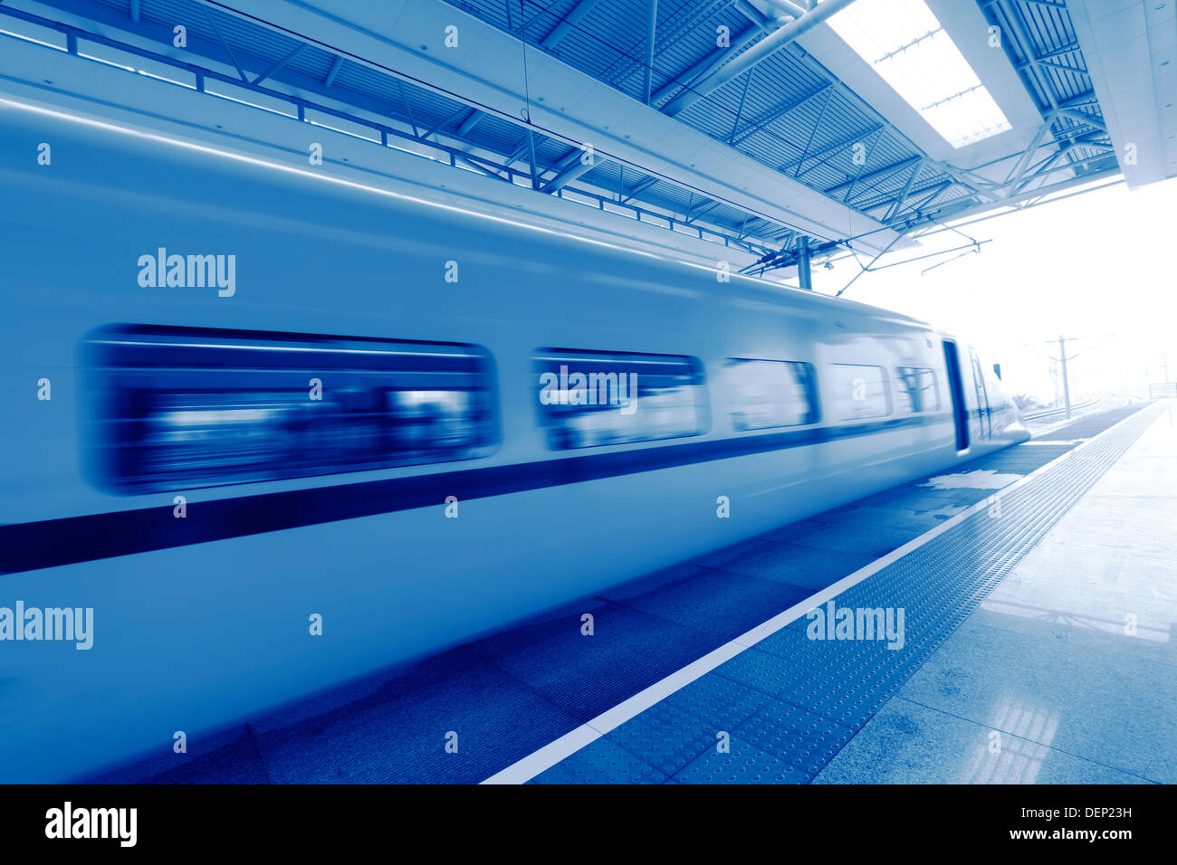 train stop at railway station Stock Photo - Alamy