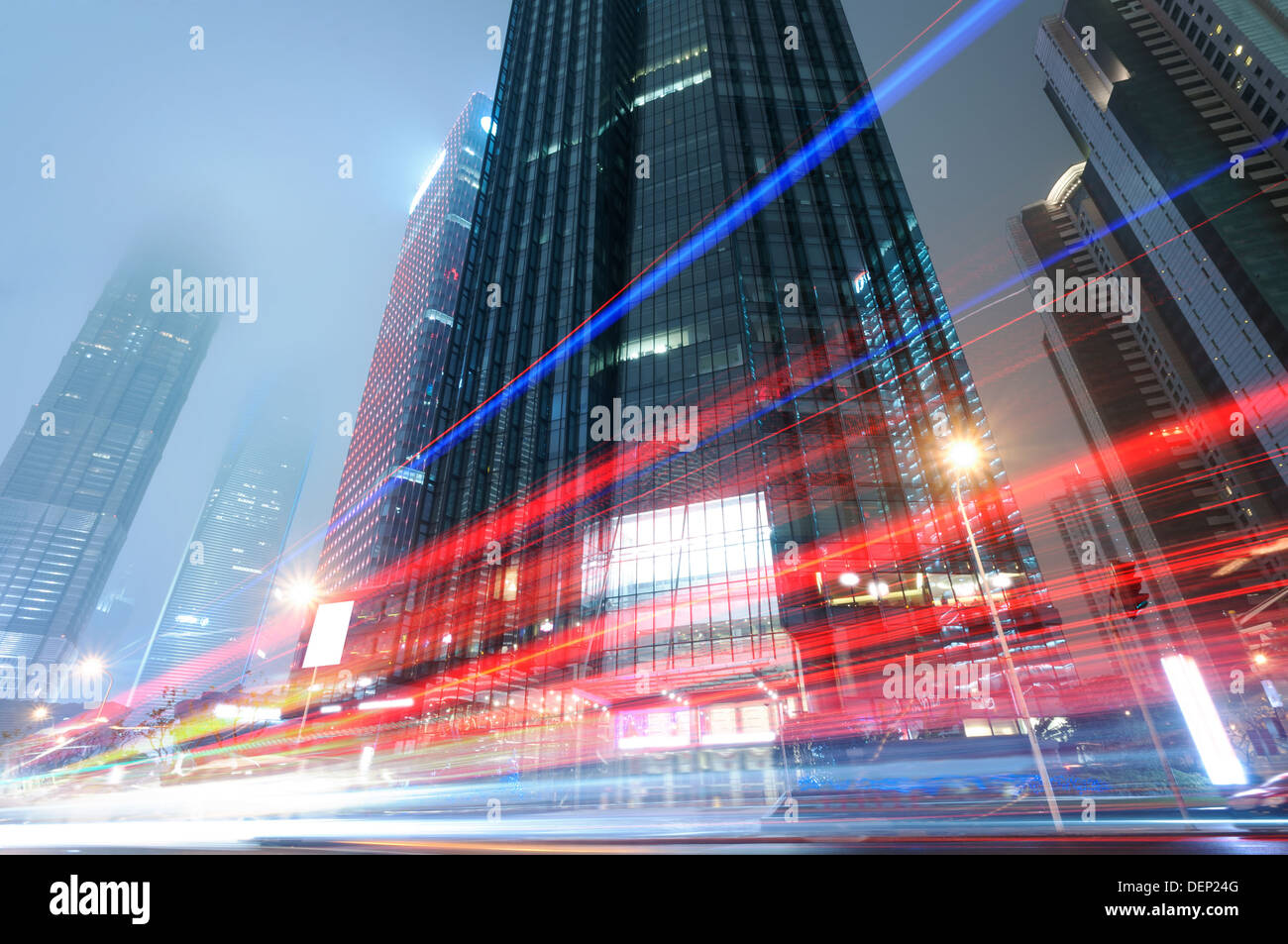 the light trails on the modern building background in shanghai china ...