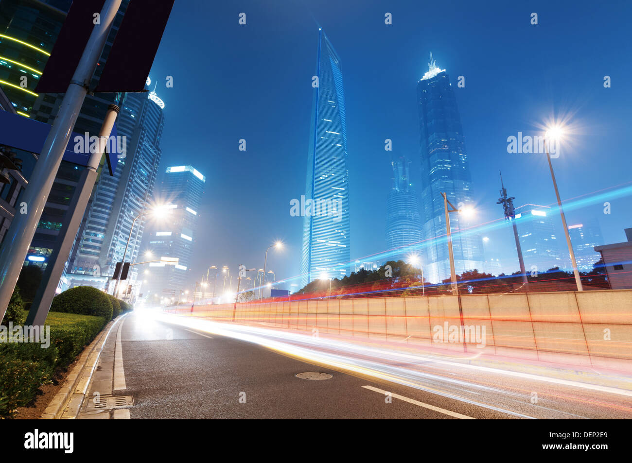 the light trails on the modern building background in shanghai china ...