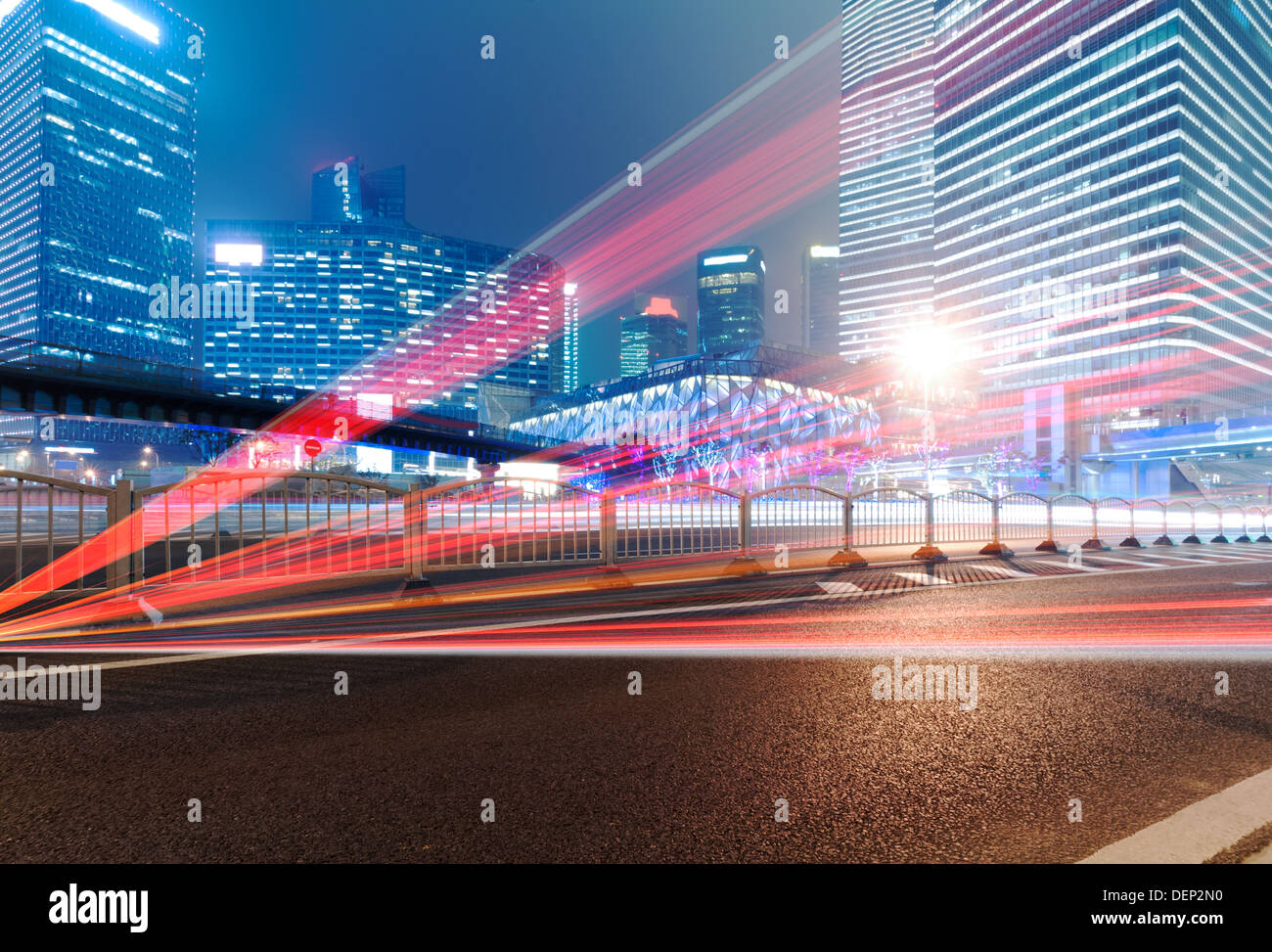the light trails on the modern building background in shanghai china ...