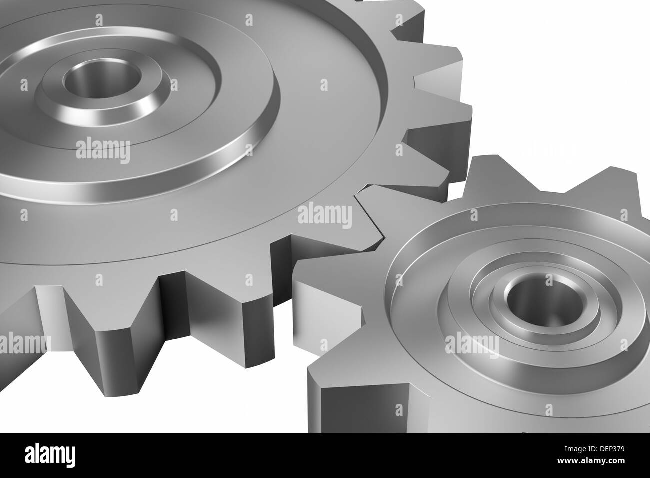 Two interlocking cogwheels on downward diagonal Stock Photo - Alamy