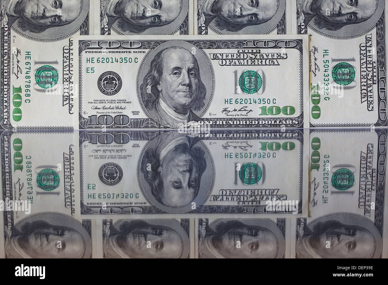 U.S. dollars on the table with mirror Stock Photo - Alamy