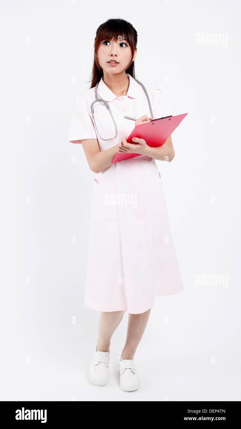 Female nurse uses stethoscope hi-res stock photography and images - Alamy