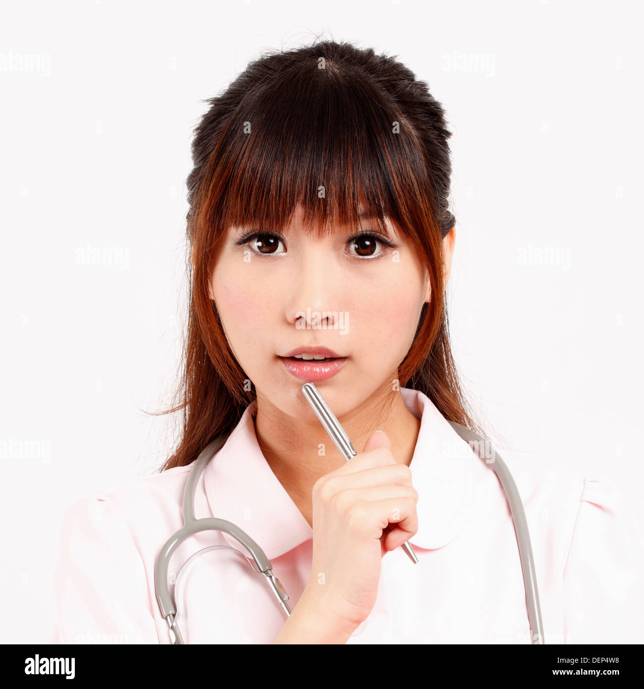 Nurse uses pen and board Stock Photo - Alamy