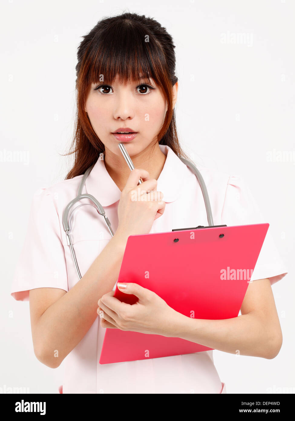 Nurse uses pen and board Stock Photo - Alamy