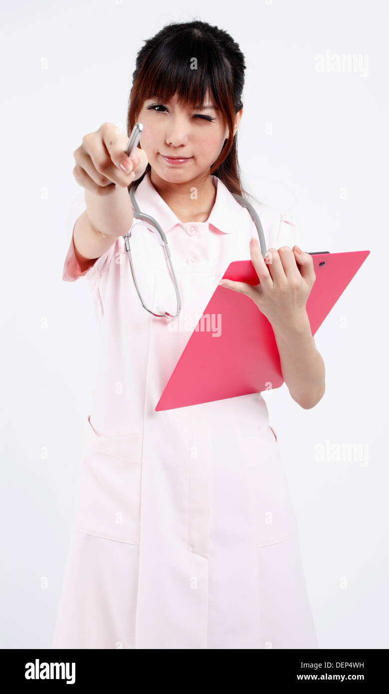Nurse uses pen and board Stock Photo - Alamy