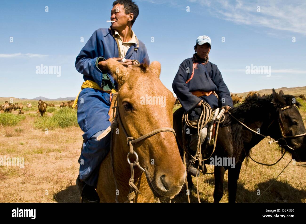 Central asia people on horses hi-res stock photography and images - Alamy