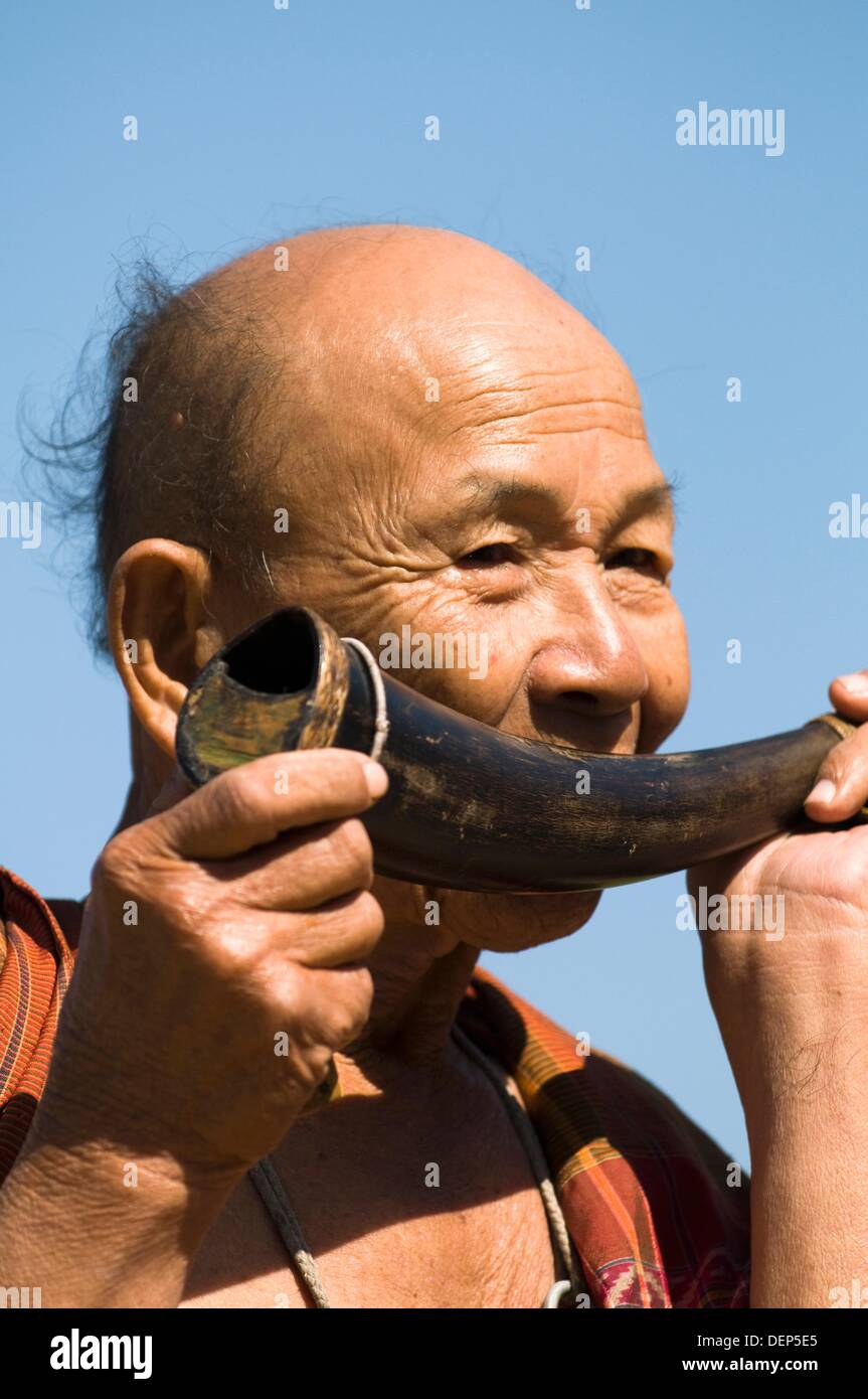 A Thai man from Isan playing a traditional musical instrument Stock ...