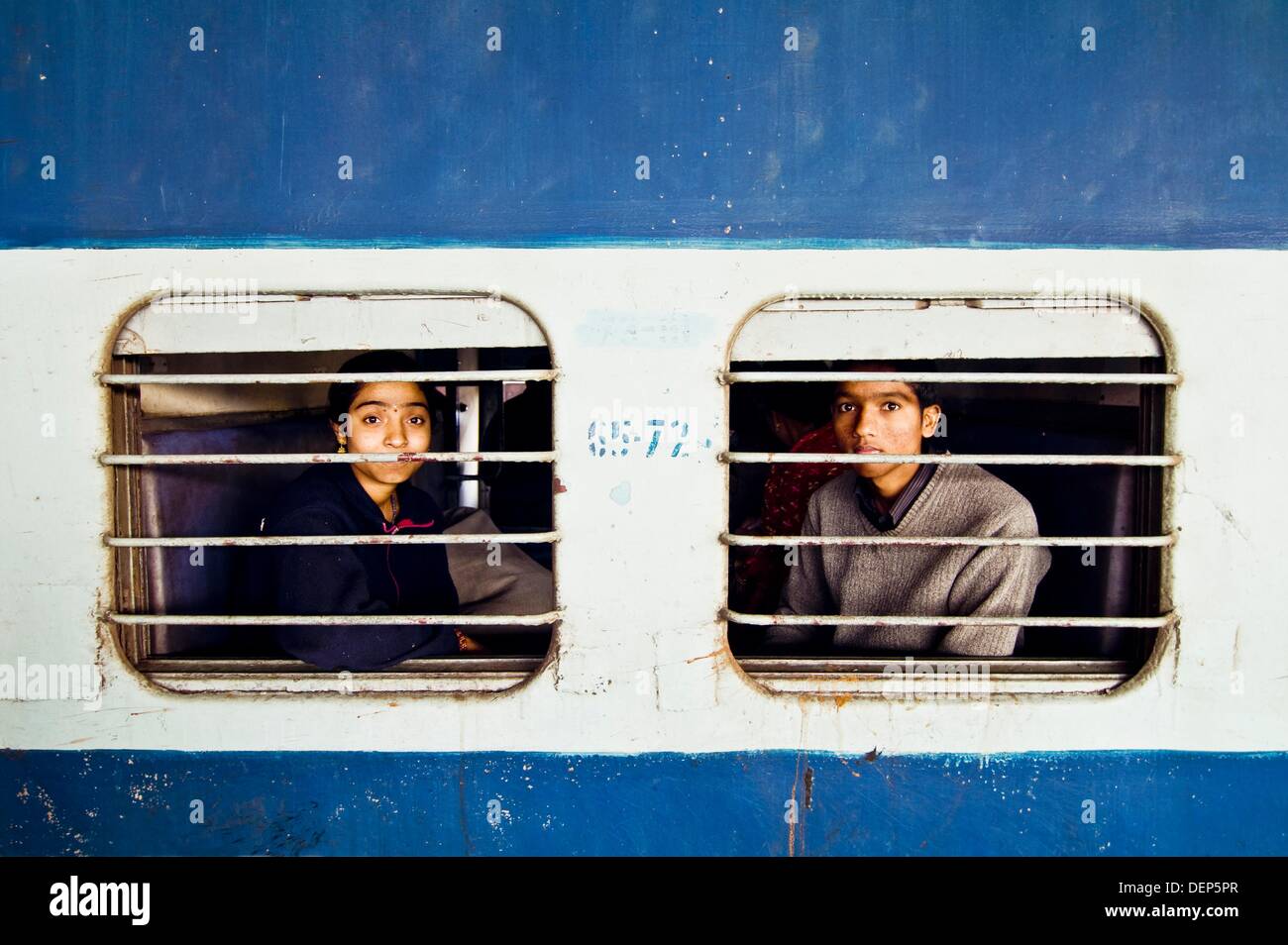 Passengers in a 2nd sleeper class train in India Stock Photo - Alamy