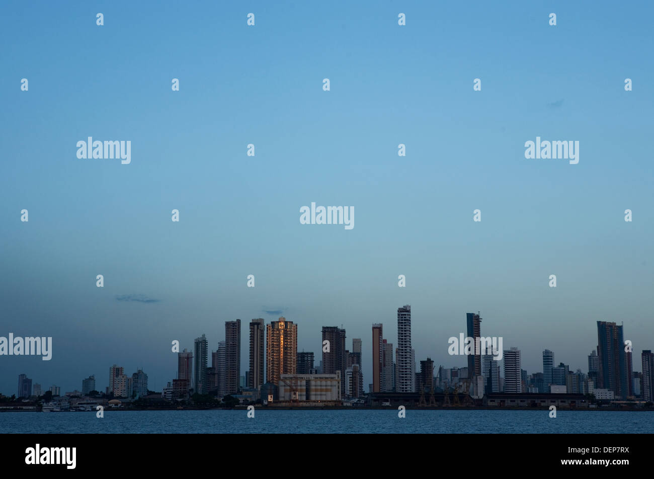View from the Amazon River at dawn of the buildings in the city of ...