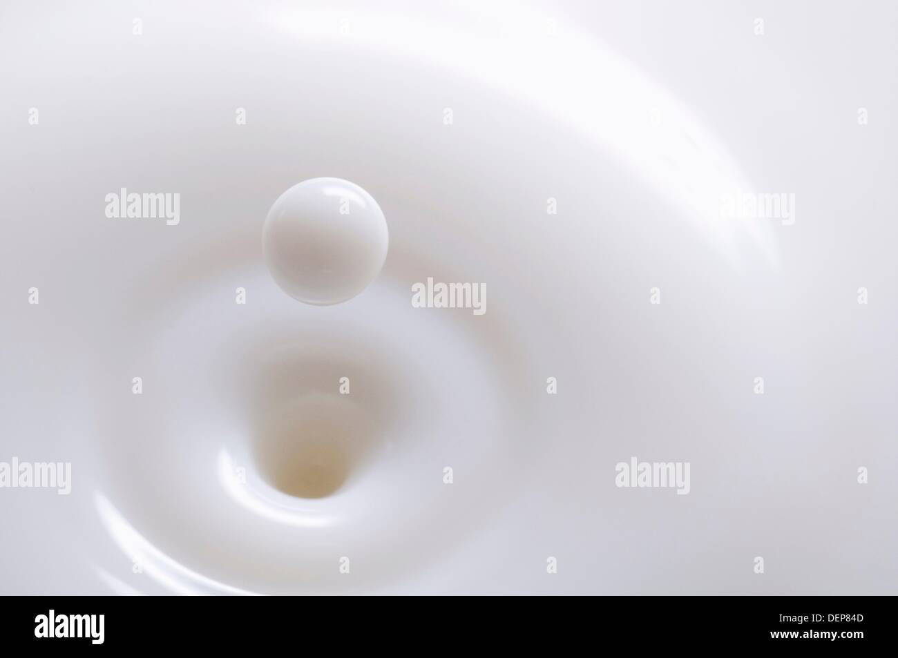 Milk ripple, Milk drop Stock Photo - Alamy