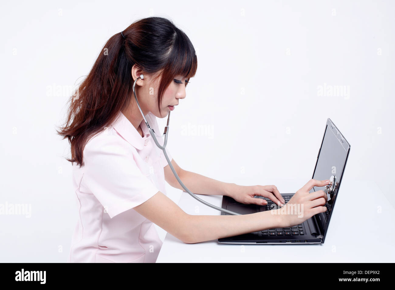 Checking computer hi-res stock photography and images - Alamy