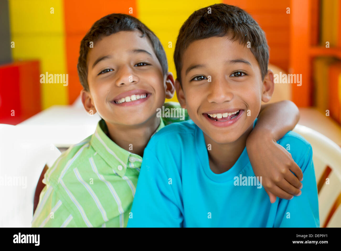 Hispanic boys smiling together Stock Photo - Alamy