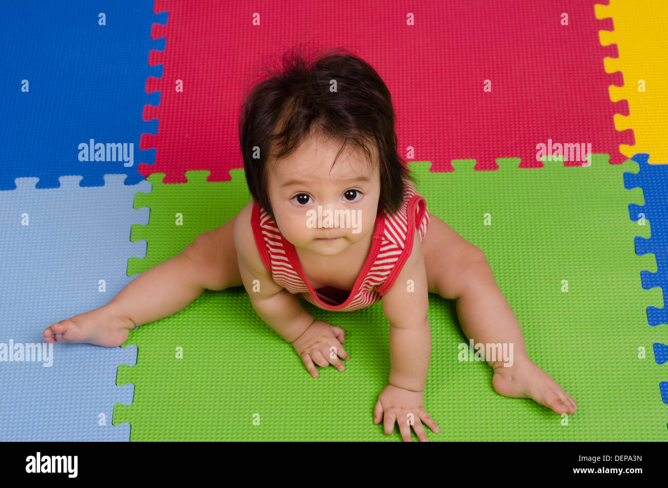 Baby sitting up Stock Photo - Alamy