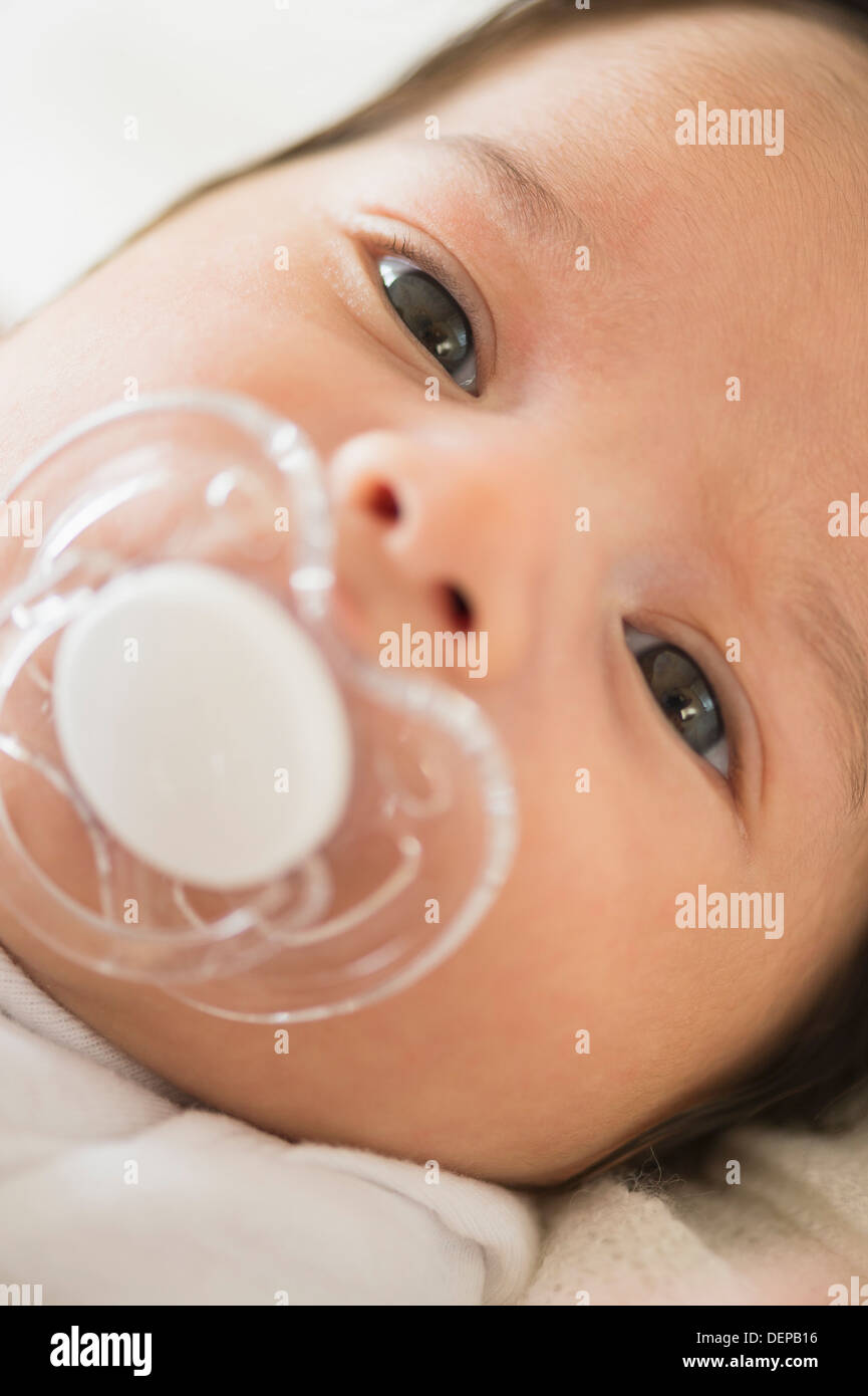 Pacifier sucking hi-res stock photography and images - Alamy