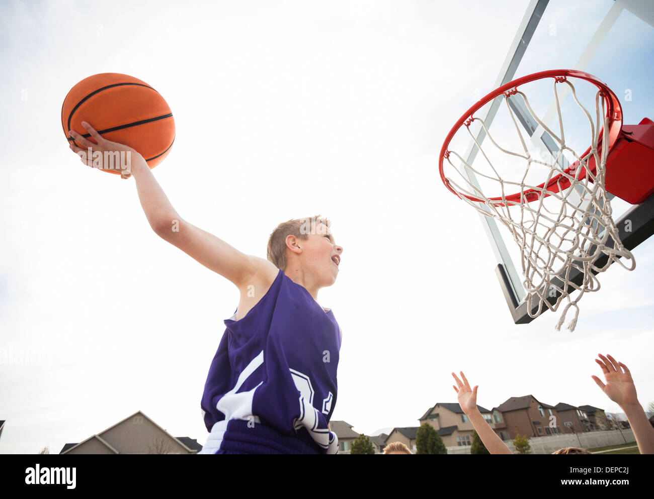 Slam dunk in motion hi-res stock photography and images - Alamy