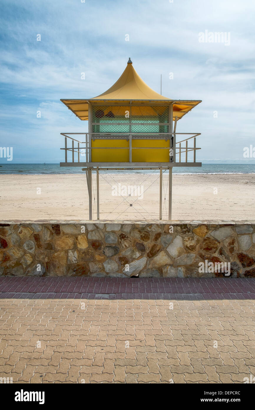 Lifeguards watch out from a surf life saving tower on an Australian ...