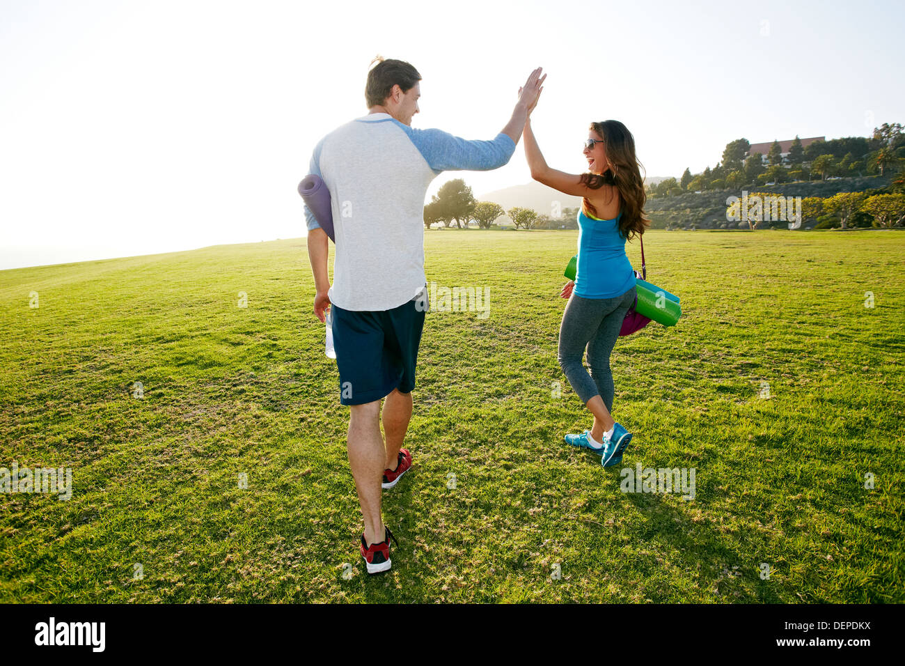 High fiving hi-res stock photography and images - Alamy