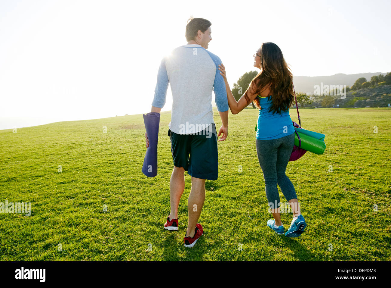 Two women walking field rear view hi-res stock photography and images ...