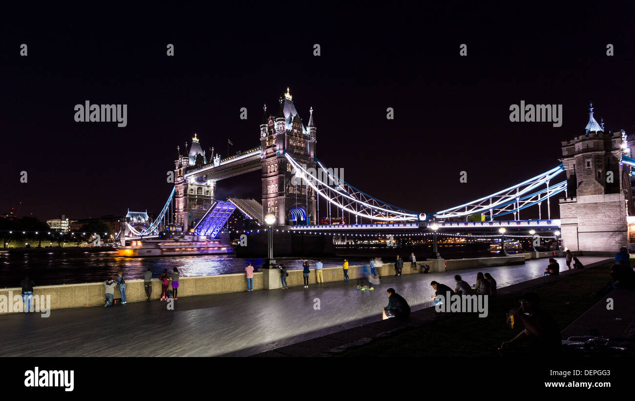 LONDON - CIRCA 2013: Open Tower Bridge and Tower of London during the ...