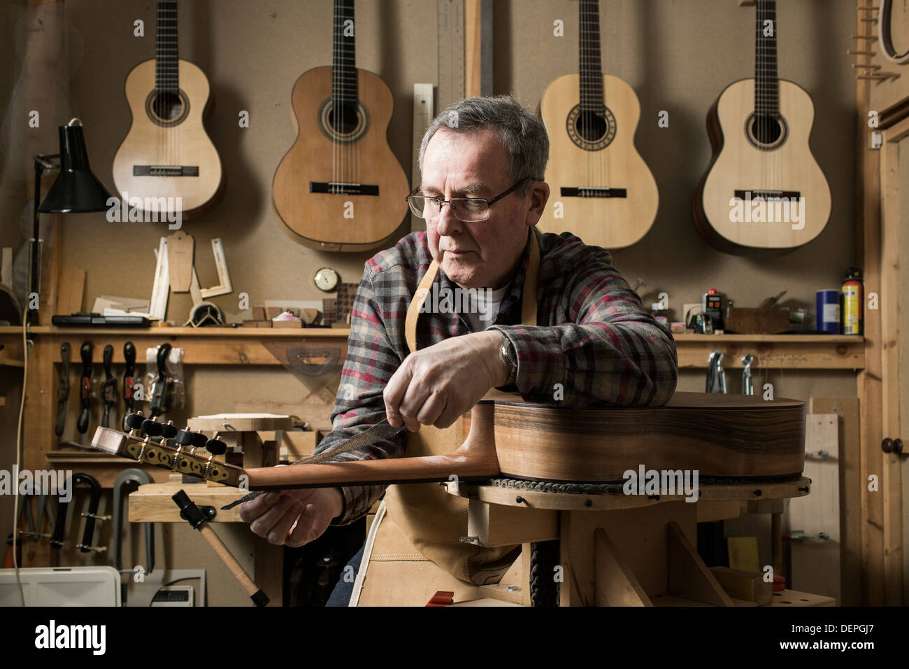 Close up guitar maker tuning hi-res stock photography and images - Alamy