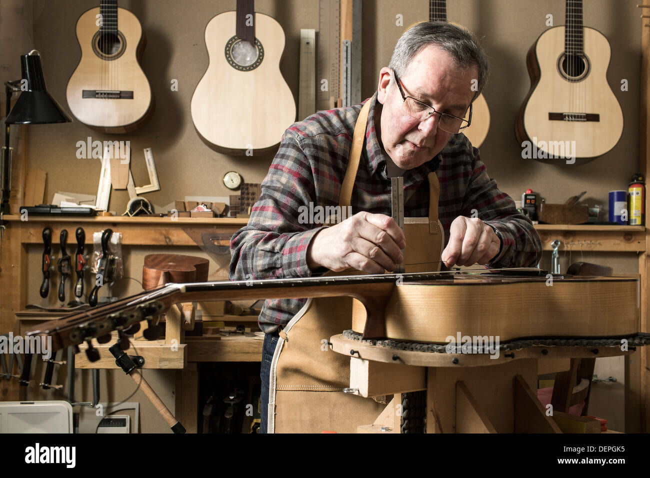 Close up guitar maker tuning hi-res stock photography and images - Alamy