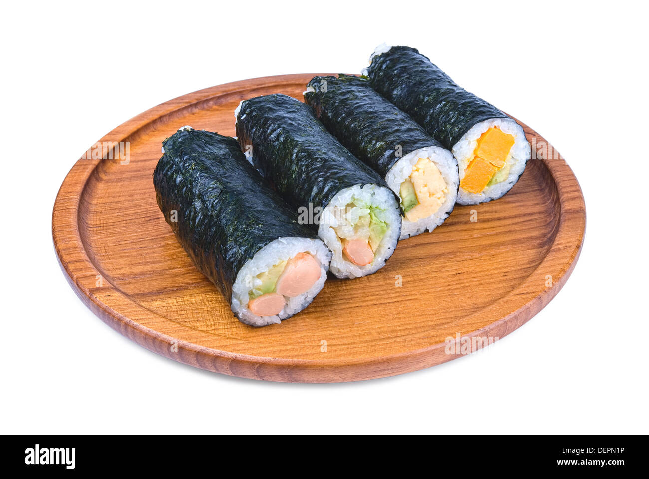 traditional japanese sushi on wooden plate isolated on a white ...
