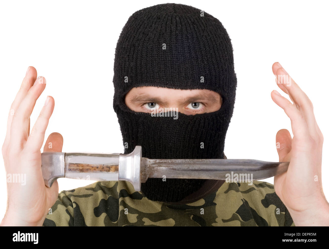 The man with a knife in a black mask. Isolated Stock Photo - Alamy
