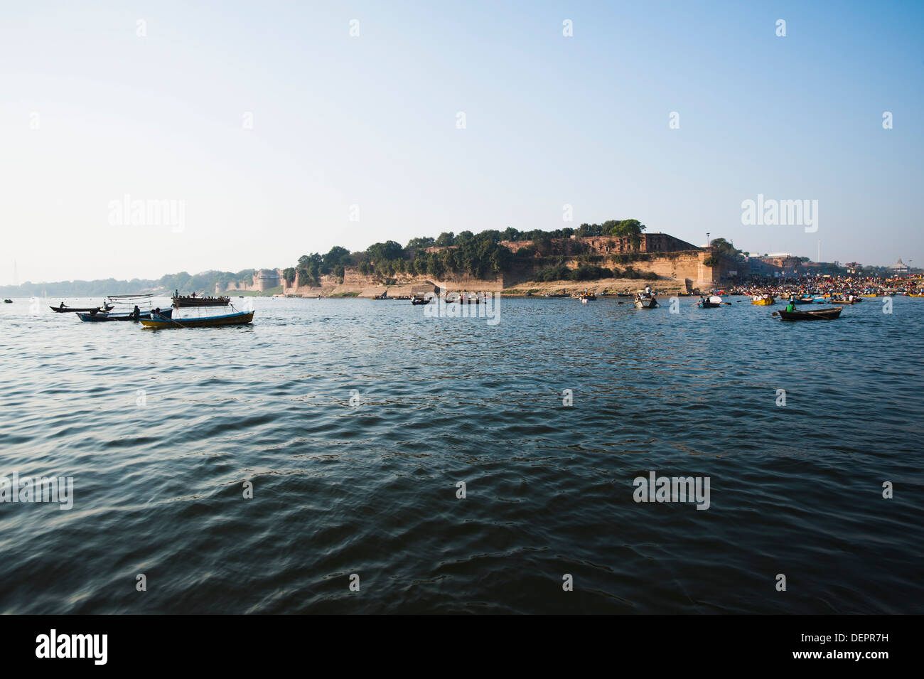 Boats in the Ganges River with fort in the background, Allahabad, Uttar ...
