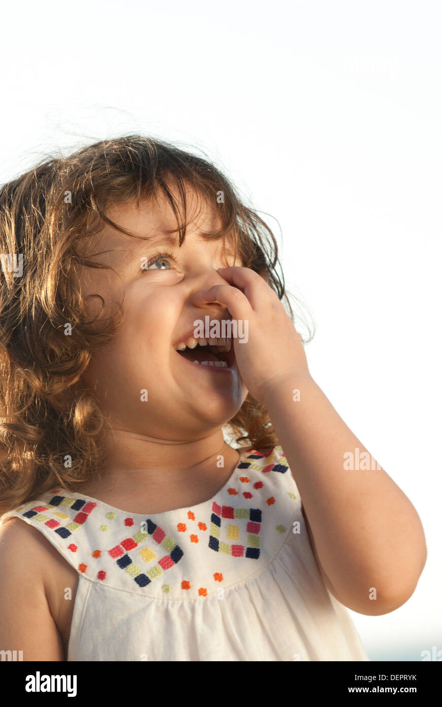 Children hand over mouth hi-res stock photography and images - Alamy