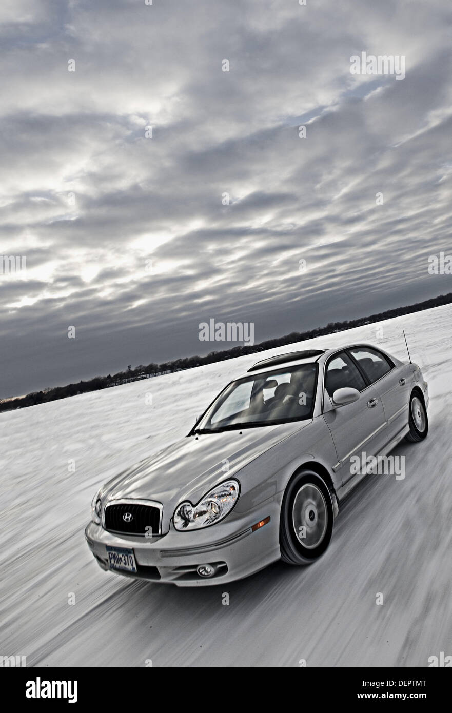 Car driving on frozen lake hi-res stock photography and images - Alamy