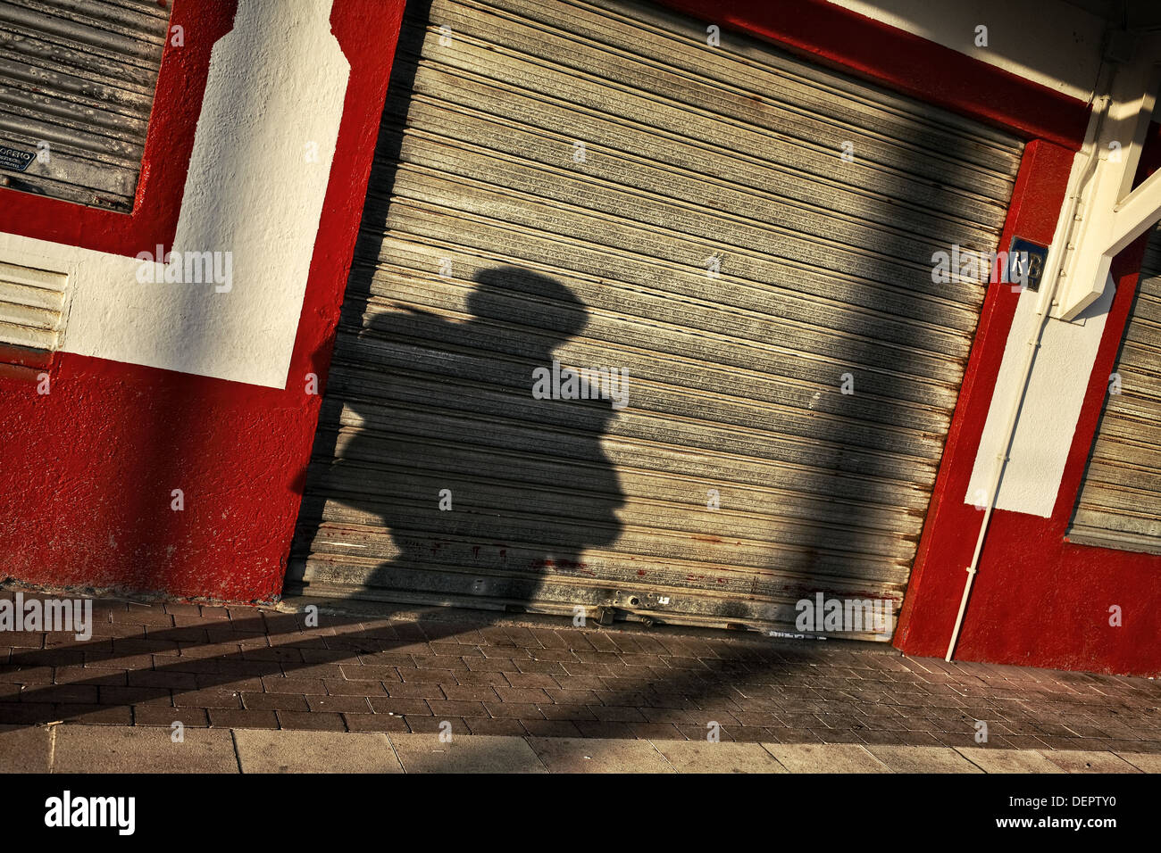 Shadow on iron gate hi-res stock photography and images - Alamy