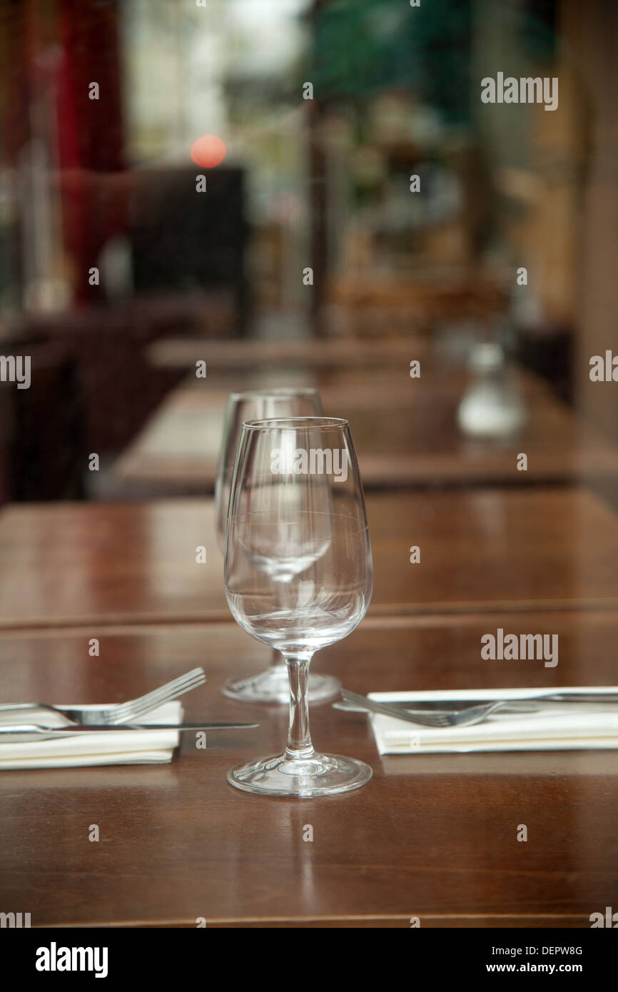 Table of a restaurant in Paris Stock Photo - Alamy