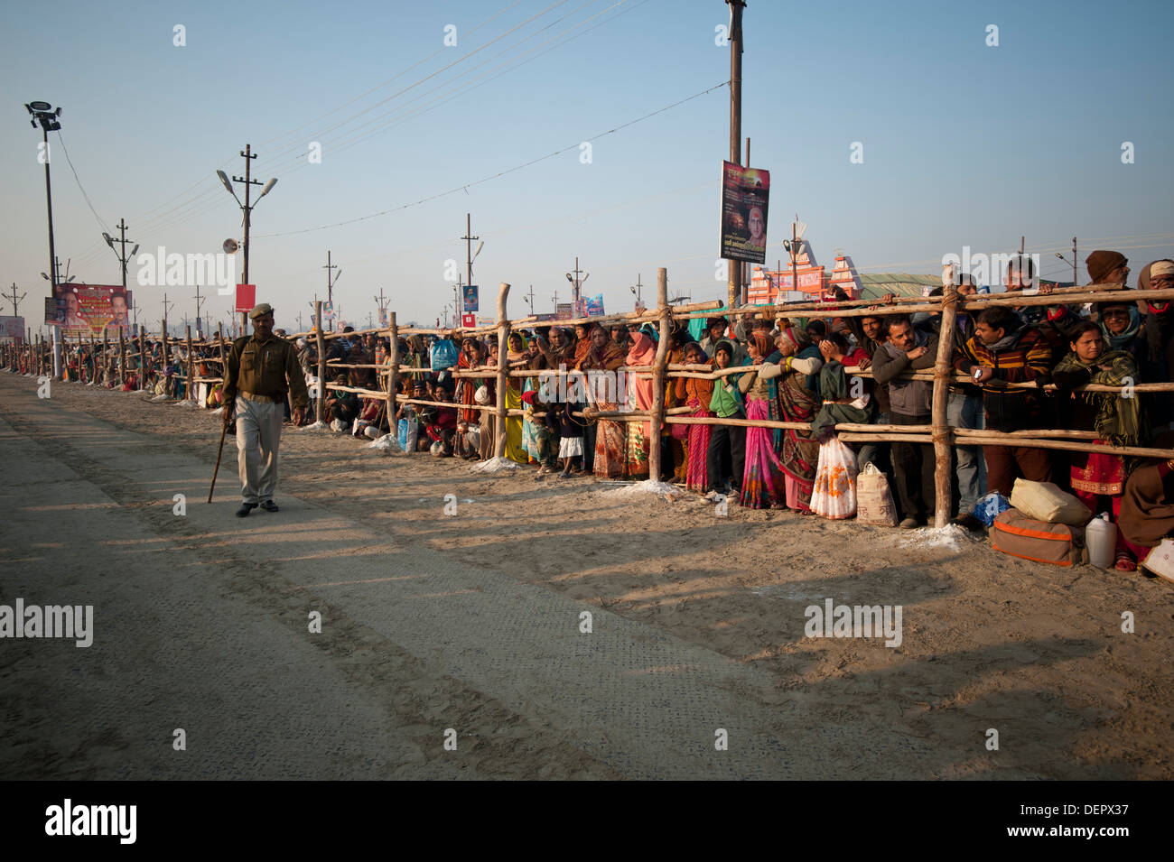 Standing along fence hi-res stock photography and images - Alamy