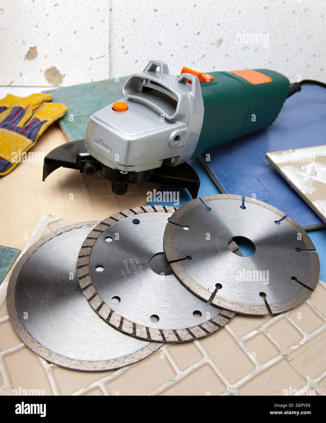 The cutting machine and various detachable disks Stock Photo - Alamy