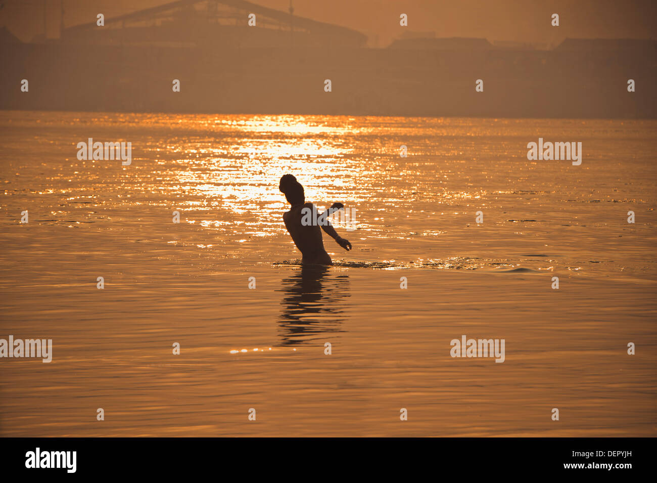 Sadhu taking a holy dip in Ganges River at Maha Kumbh, Allahabad, Uttar ...