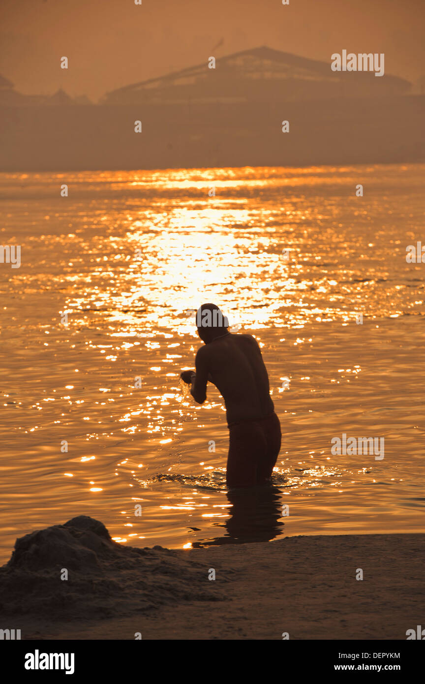 Man taking a holy dip in Ganges River at Maha Kumbh, Allahabad, Uttar ...
