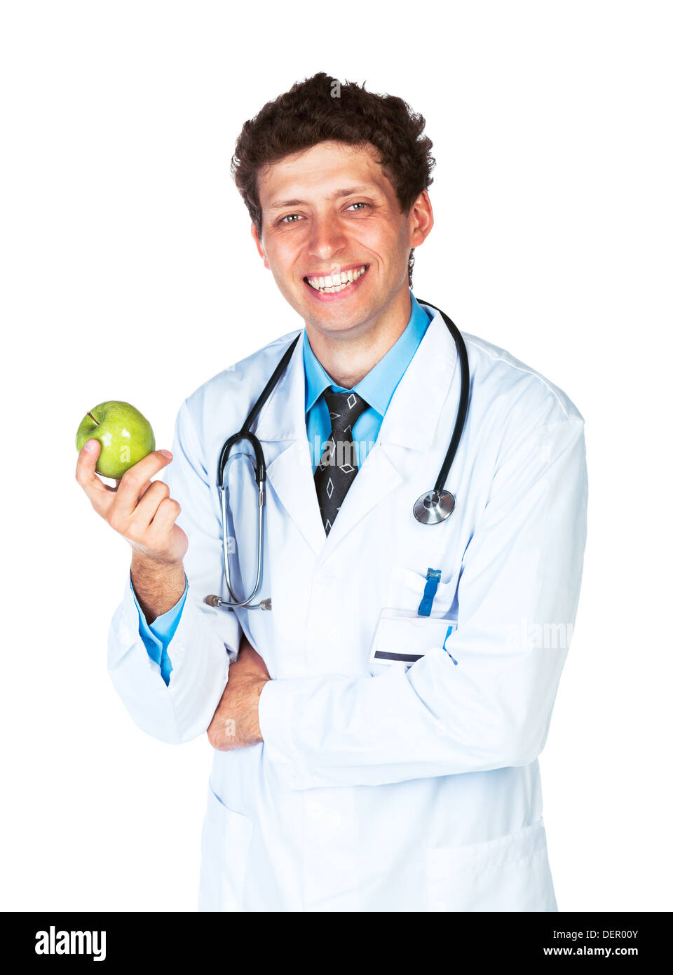 Portrait of a smiling male doctor holding green apple on white ...