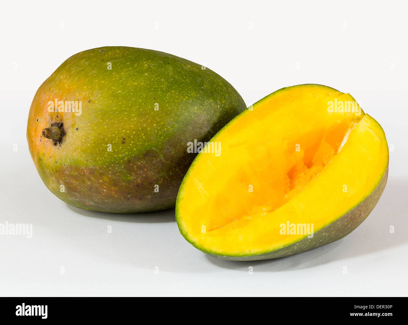Mangoes on white background Stock Photo - Alamy