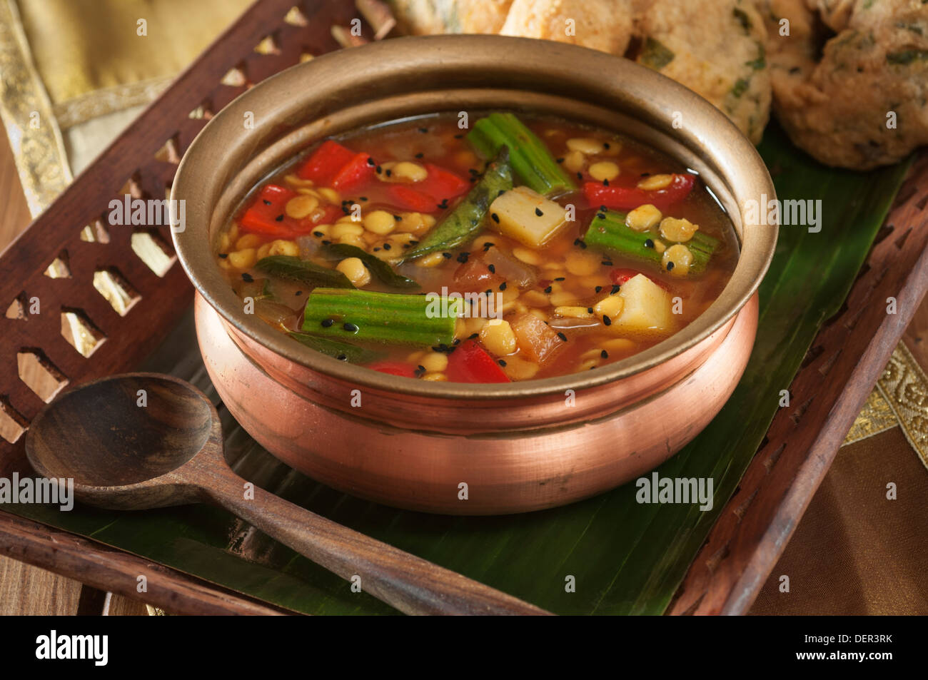 Sambhar. Lentil and vegetable stew with vadas South India Stock Photo ...