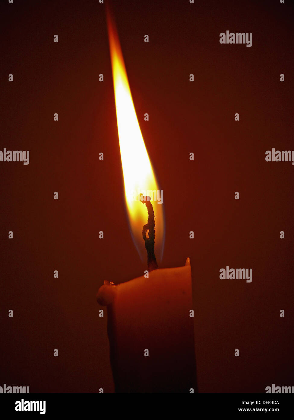 Flame of a candle in the darkness Stock Photo - Alamy
