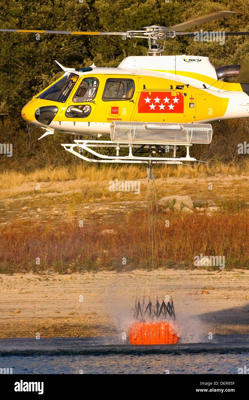 Helicopter fire fighting, Madrid, Spain Stock Photo - Alamy
