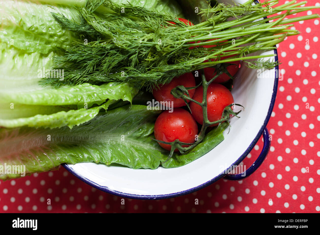 Salad draining in a colander Stock Photo - Alamy