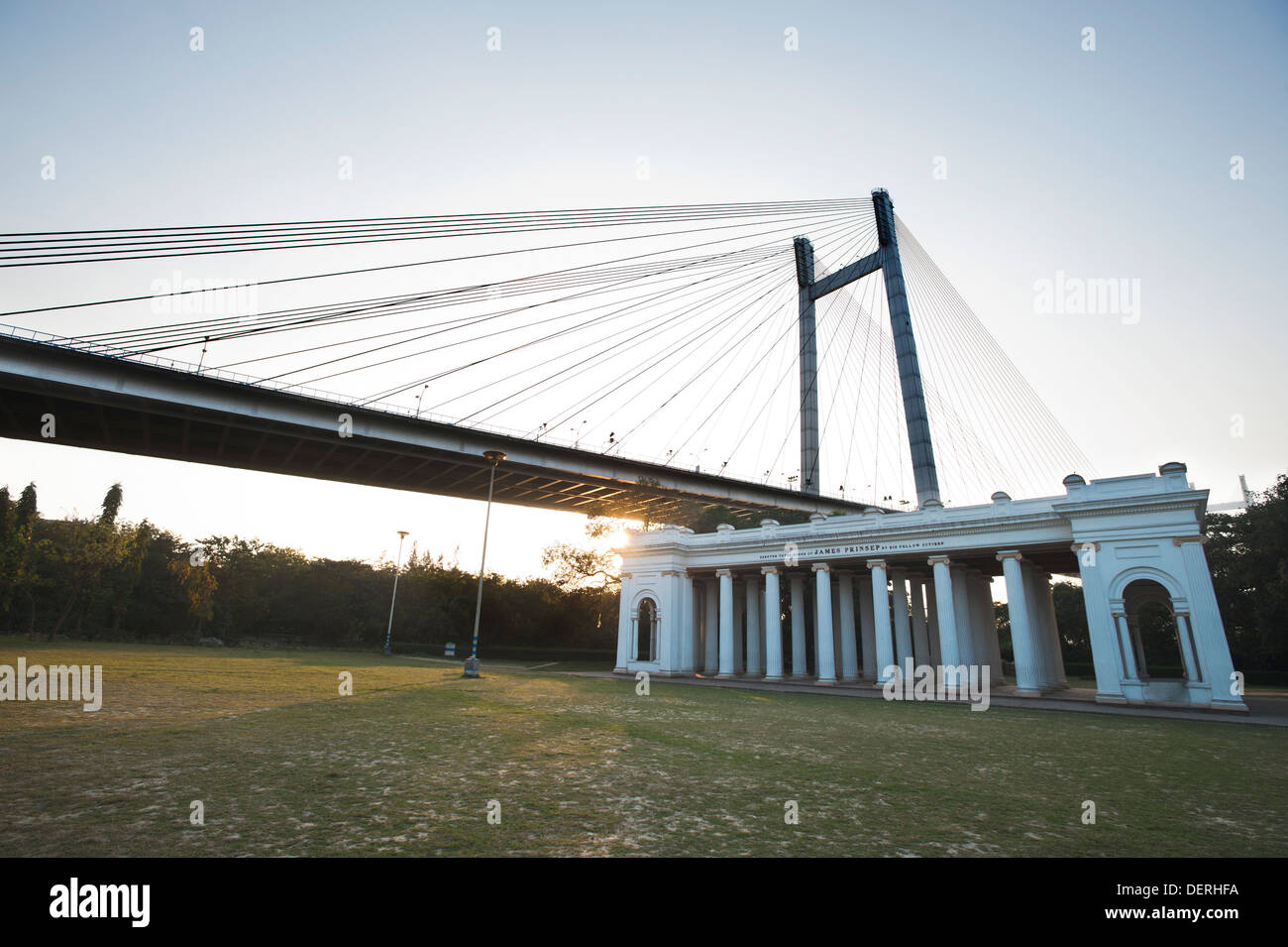 Facade of a memorial with bridge in the background, Prinsep Ghat ...