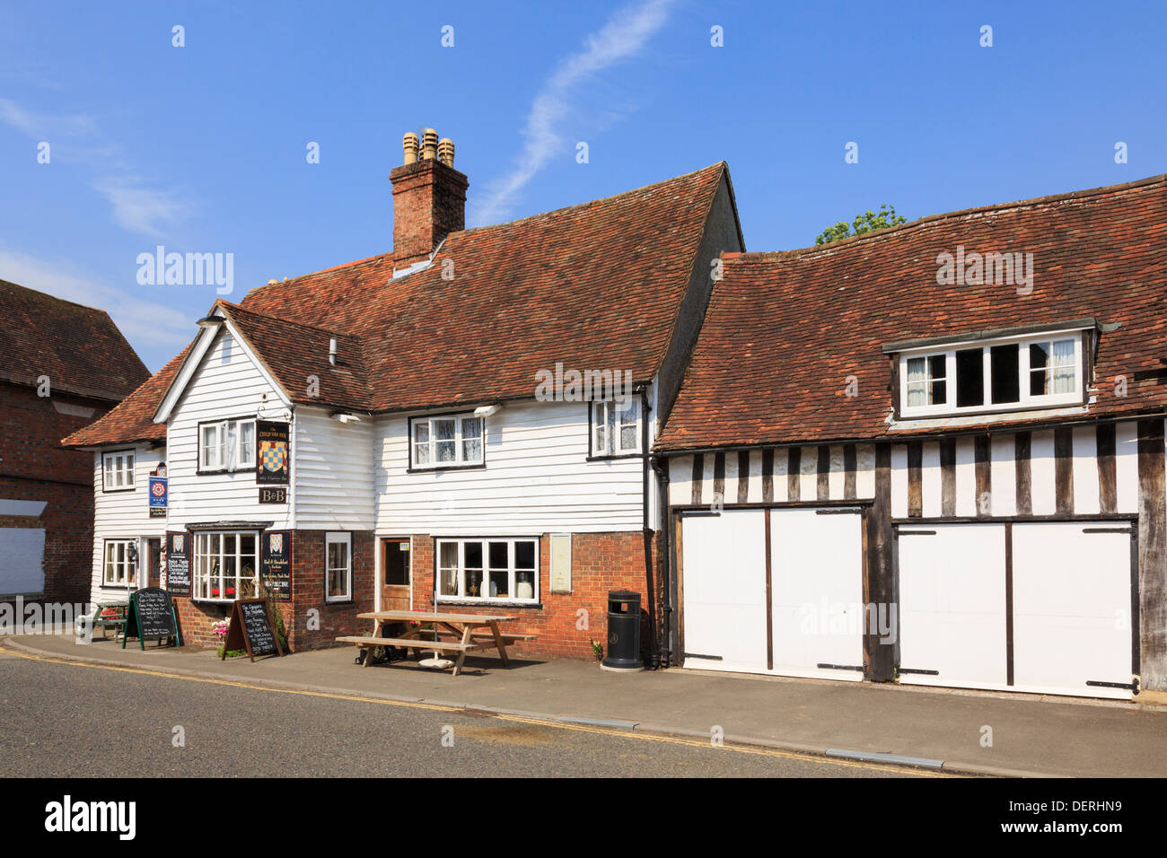 The Chequers 14th century coaching Inn in a typical white clapboard ...