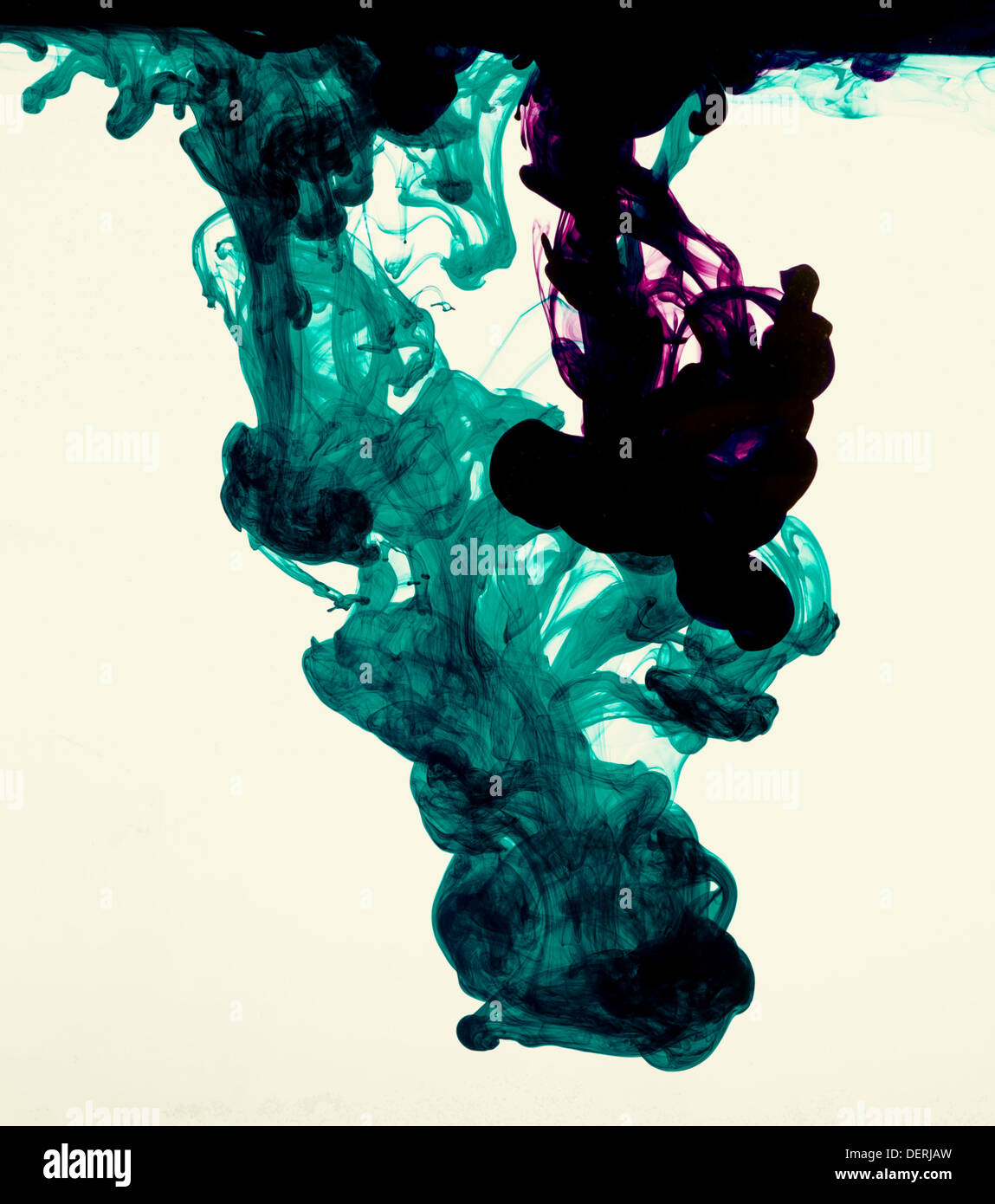 inks in water on white background Stock Photo - Alamy