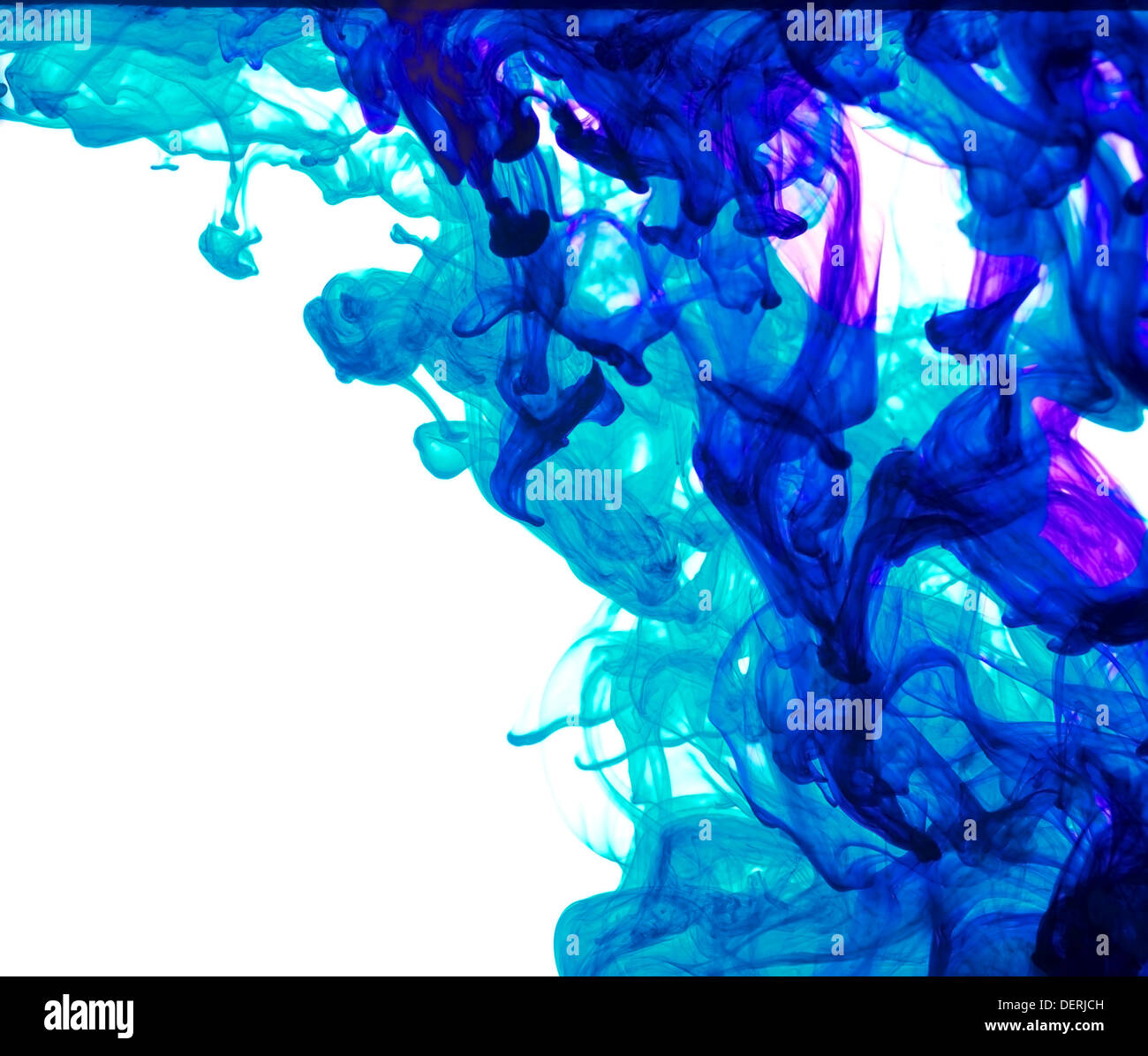 inks in water on white background Stock Photo - Alamy