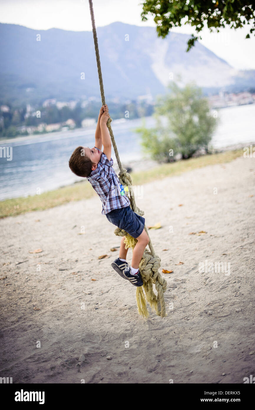 child climb a rope Stock Photo - Alamy