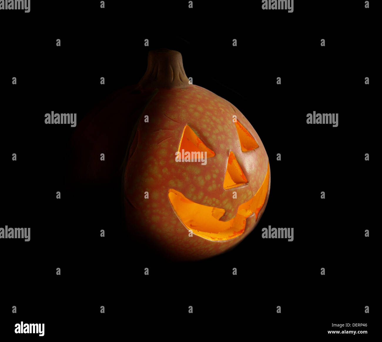 shining pumpkin helloween on black background Stock Photo - Alamy