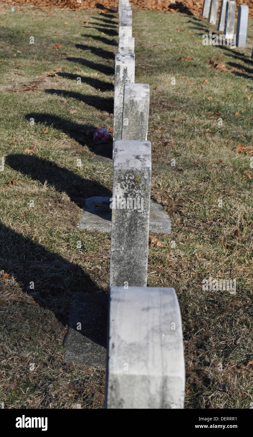 Cemetery headstones in a line Stock Photo - Alamy